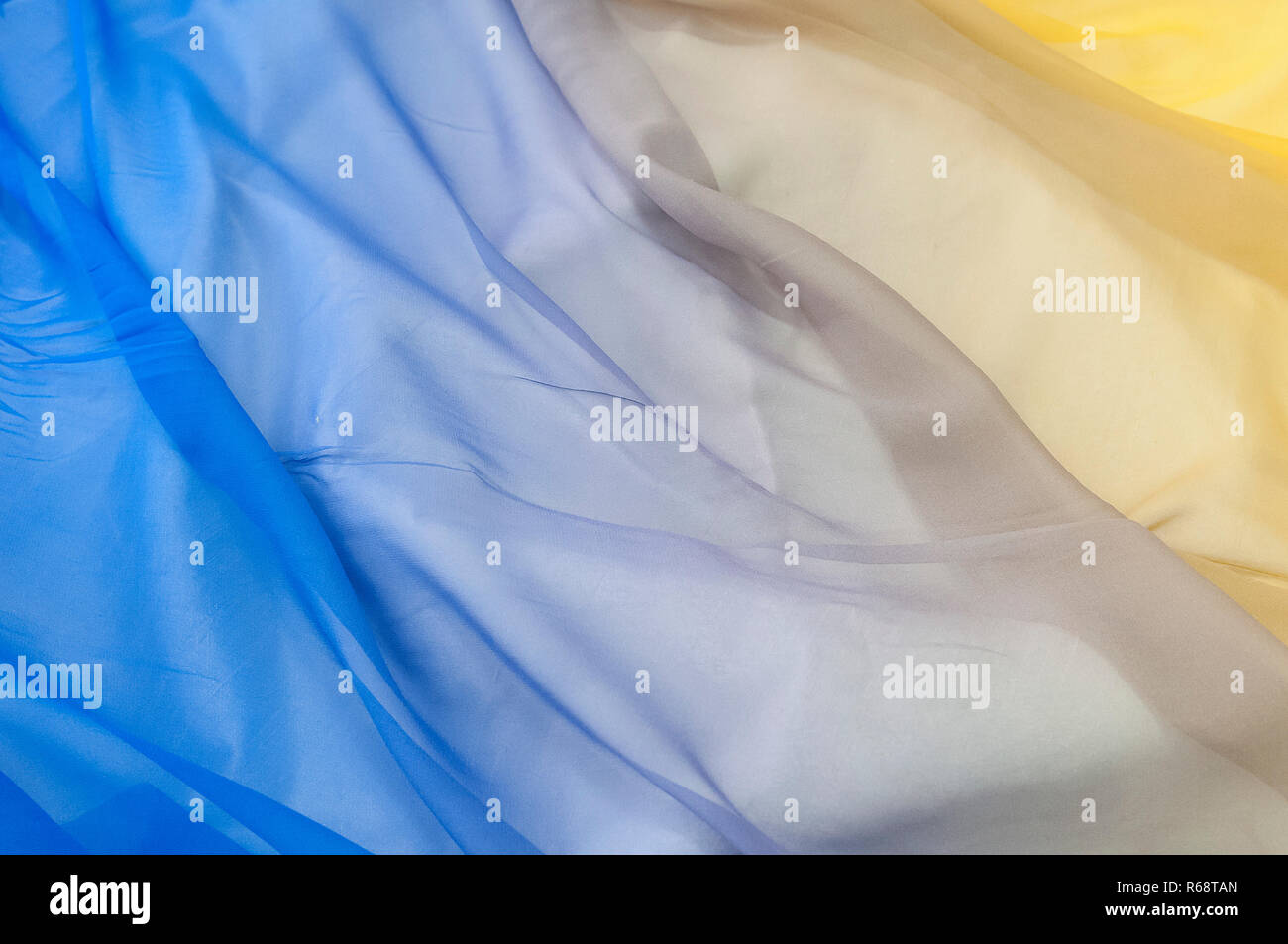 a light multicolored cloth background Stock Photo - Alamy
