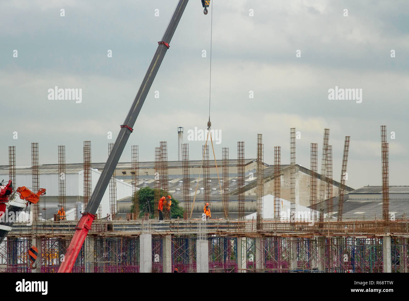Workers are building a factory Stock Photo - Alamy