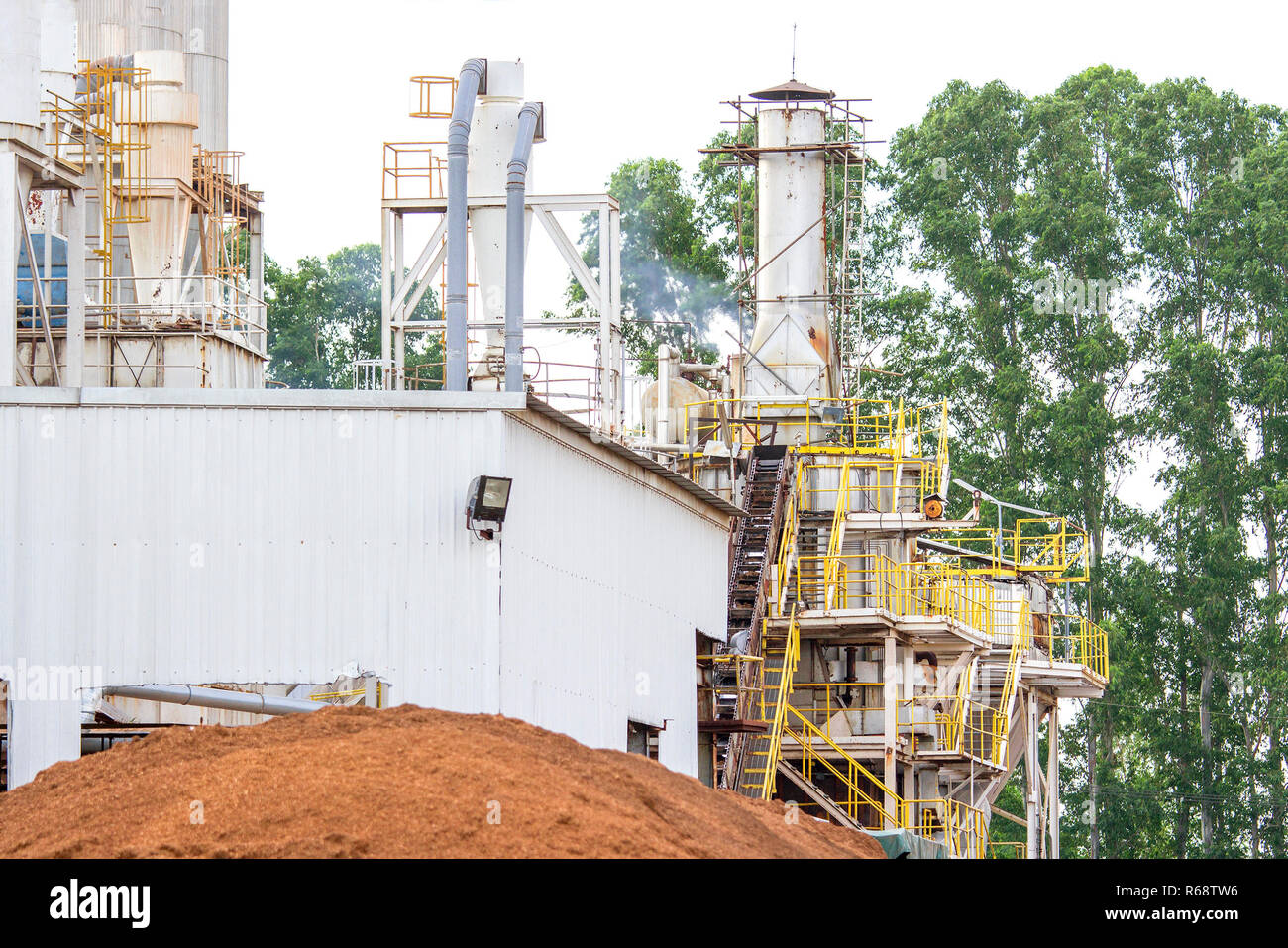 Biomass power plant is a tree background Stock Photo - Alamy