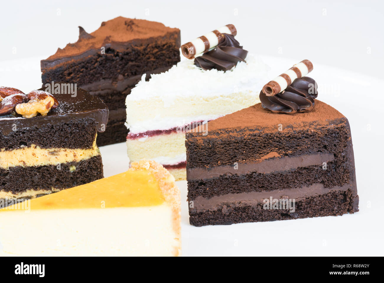 Variety sliced cakes on plate hi-res stock photography and images - Alamy