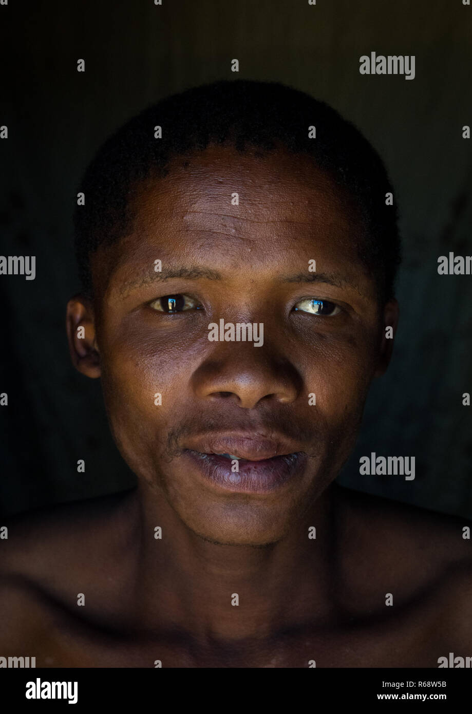Bushman tribe (San) young man portrait, Huila Province, Chibia, Angola ...