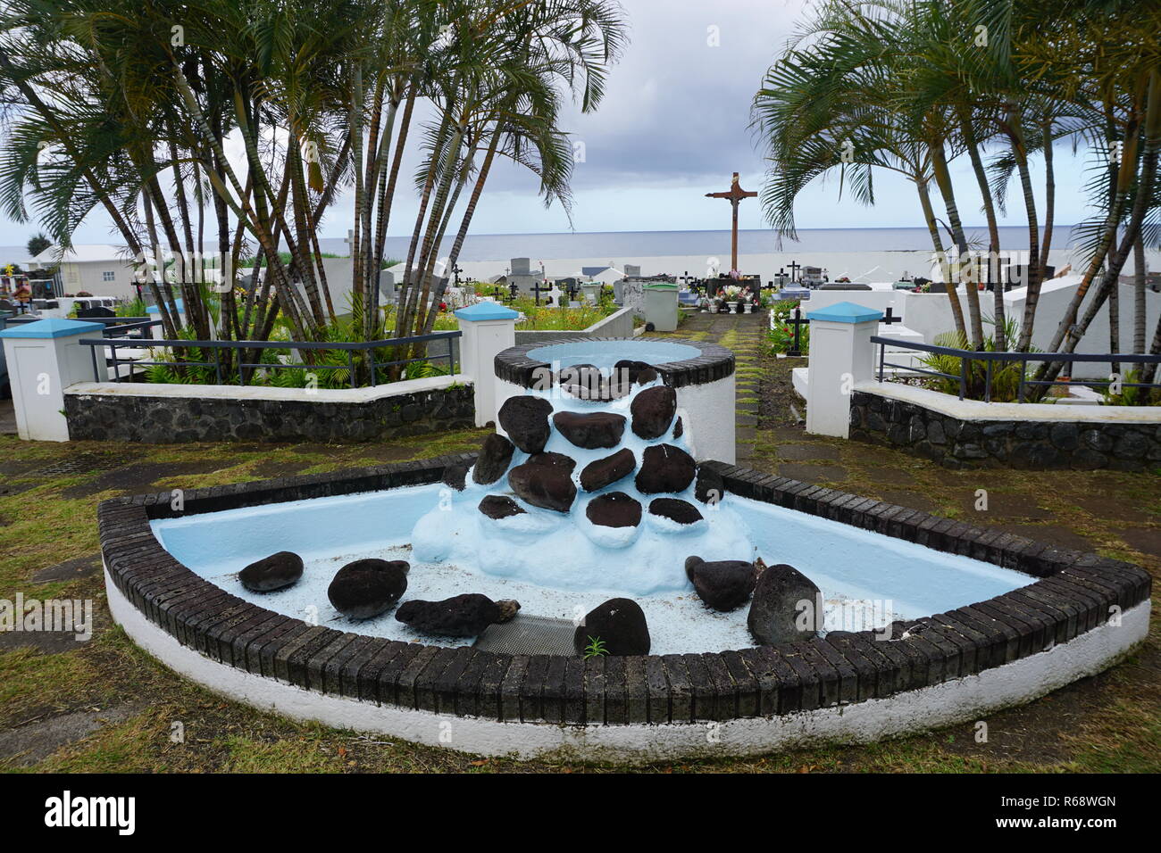 Typical and colorful cemetery with an ocean view on the tropical island ...