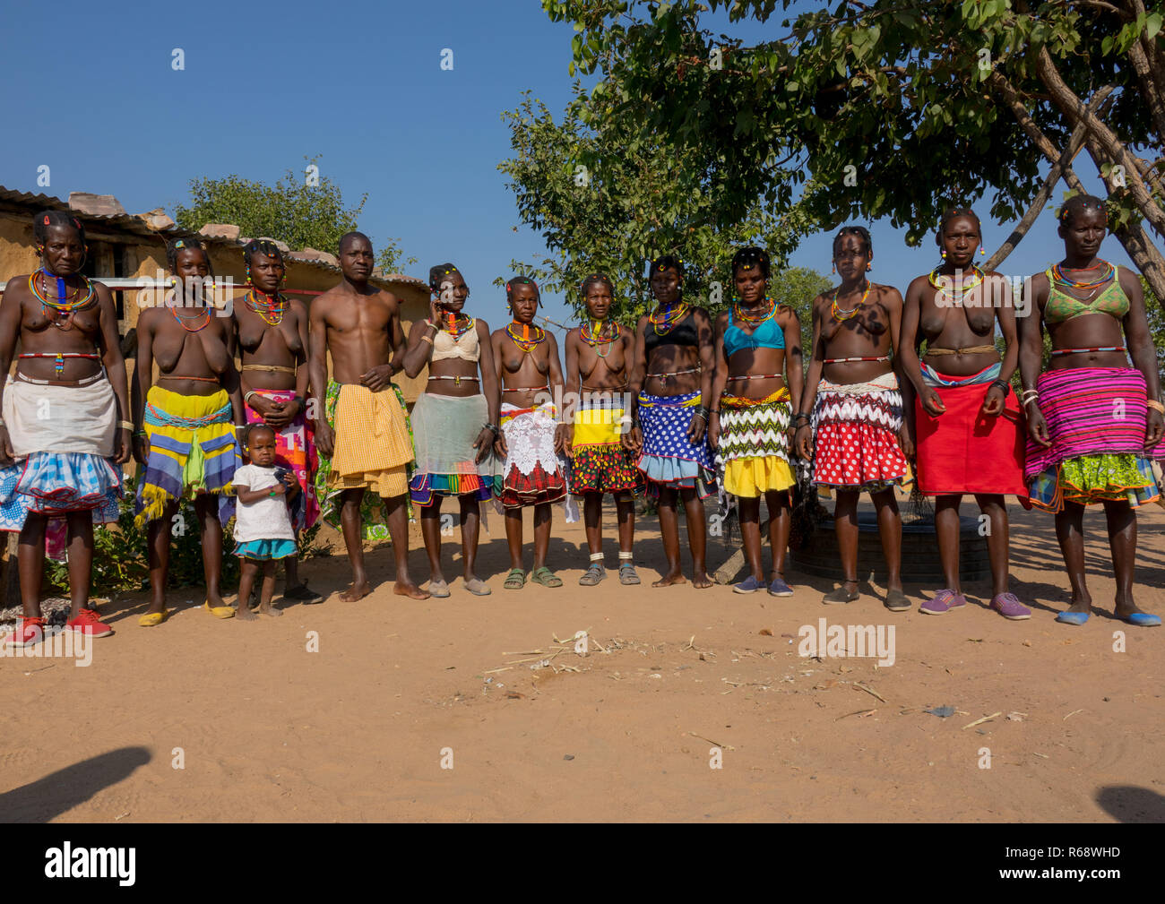 Mudimba tribe relatives with their traditional outfit in their village ...