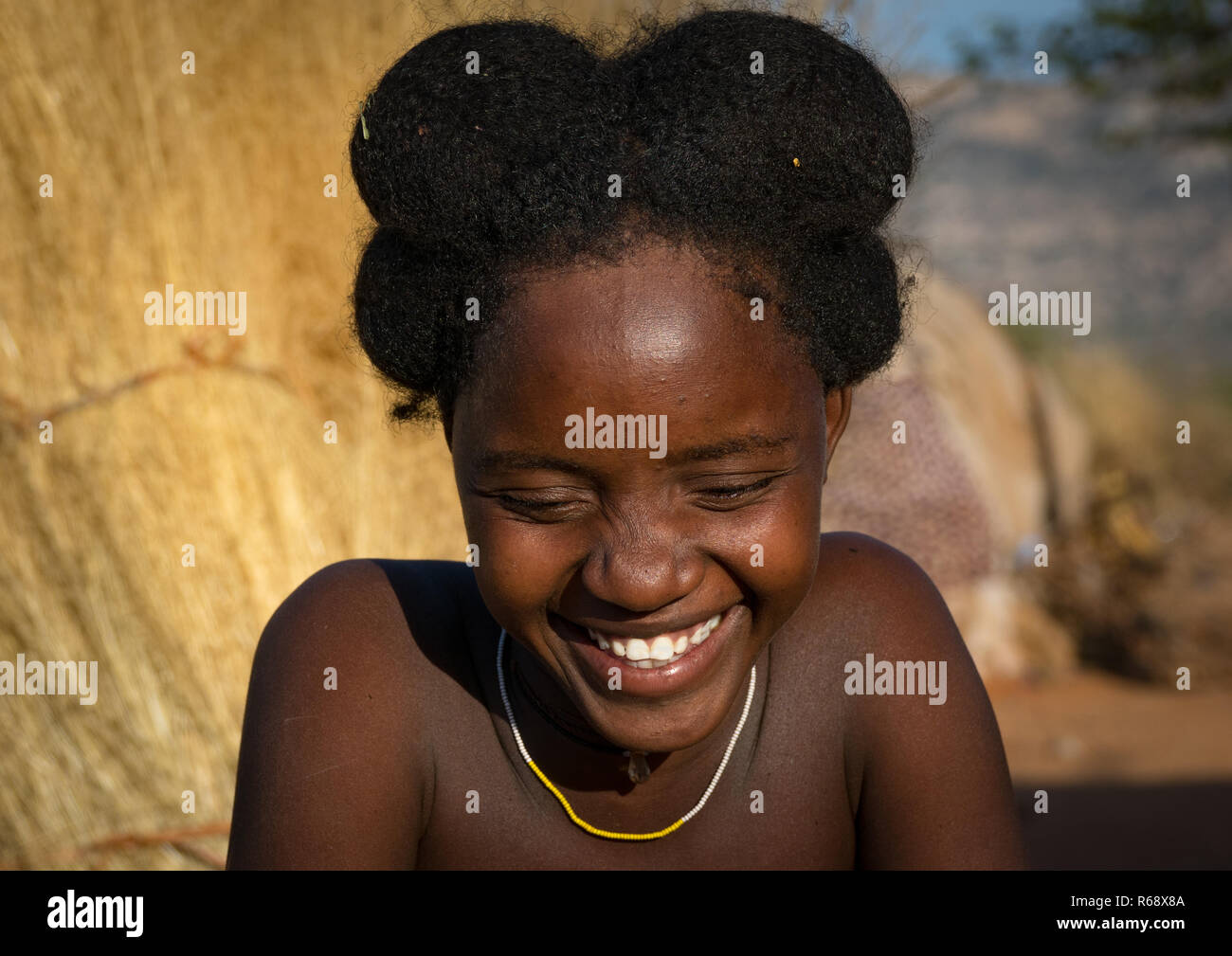 Nguendelengo tribe woman with the traditional hairstyle, Namibe ...