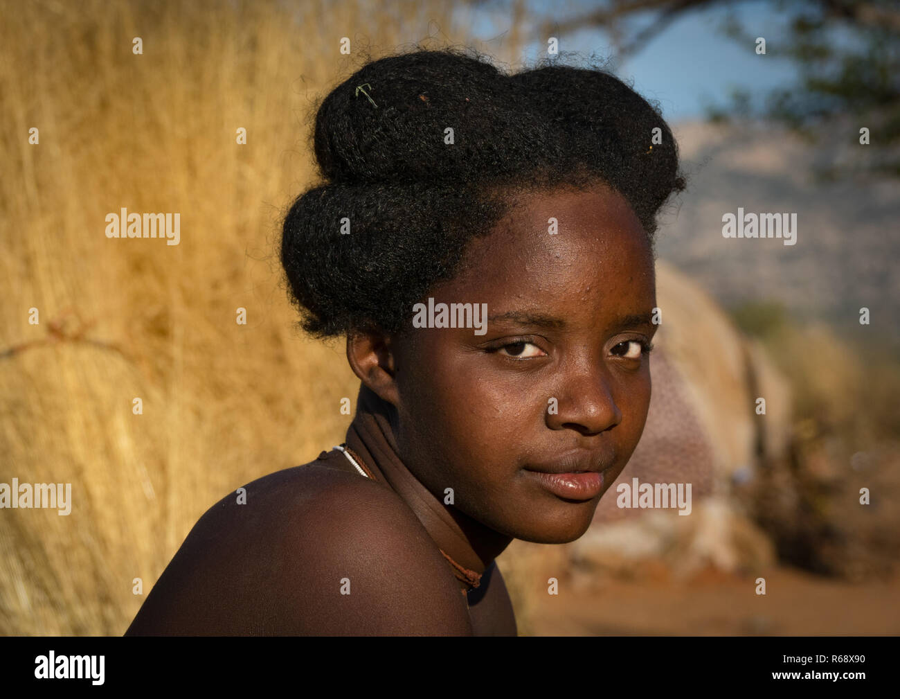 Nguendelengo tribe woman with the traditional hairstyle, Namibe ...