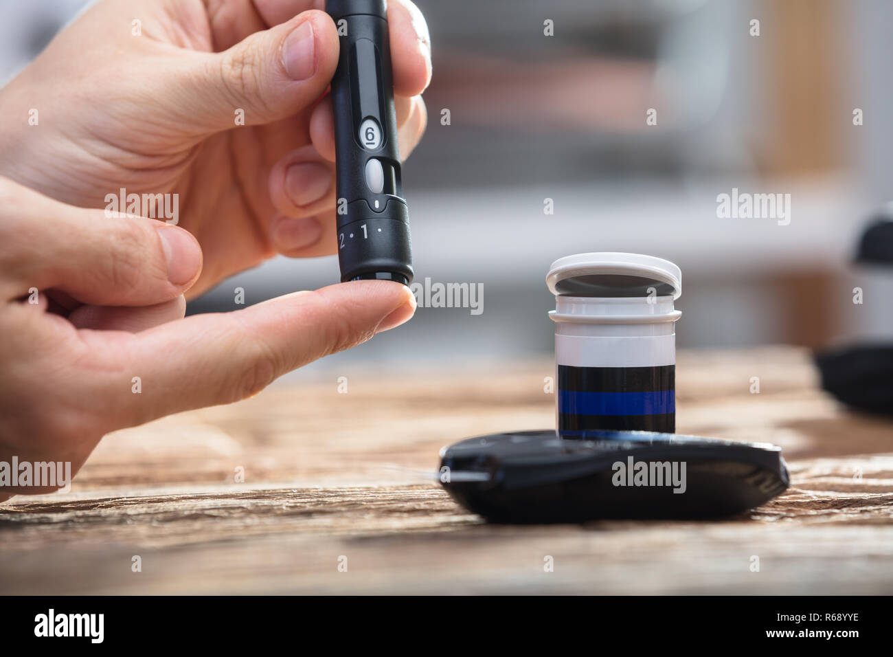 Person Checking Blood Sugar Level With Glucometer Stock Photo - Alamy