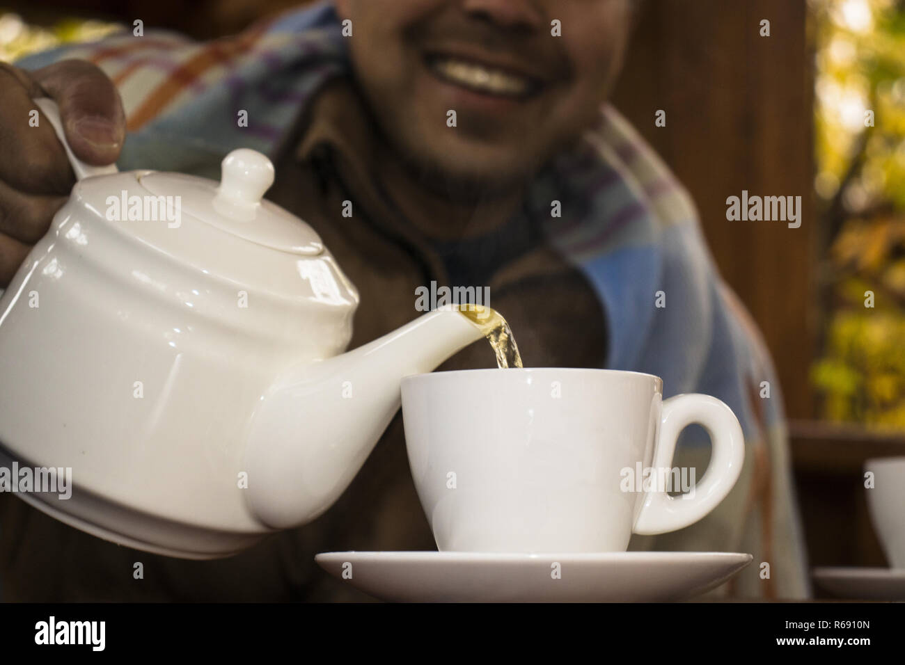 Man pouring hot water in hi-res stock photography and images - Alamy