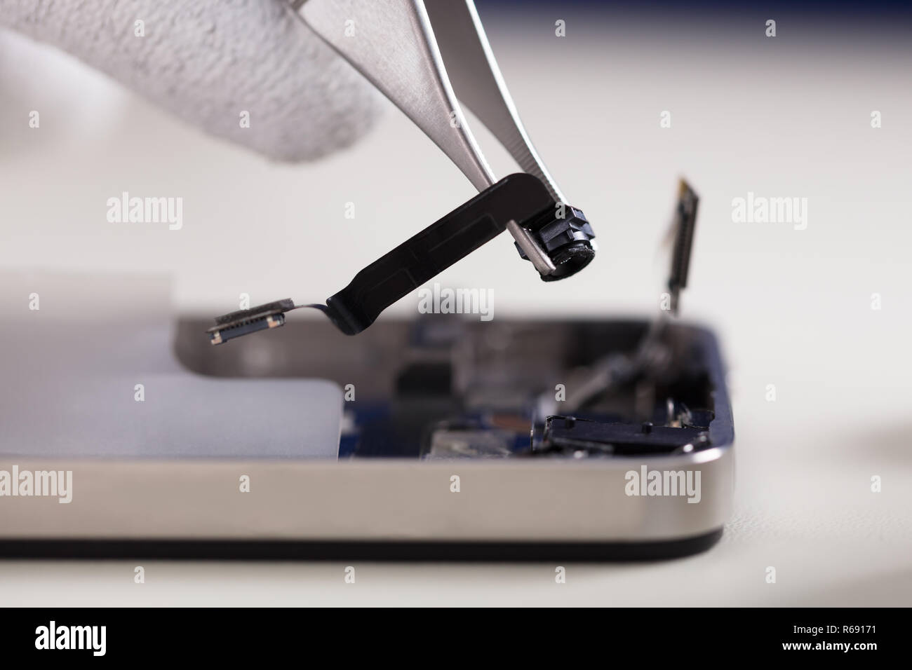 Tweezers Changing Broken Camera Of Mobile Phone Stock Photo - Alamy