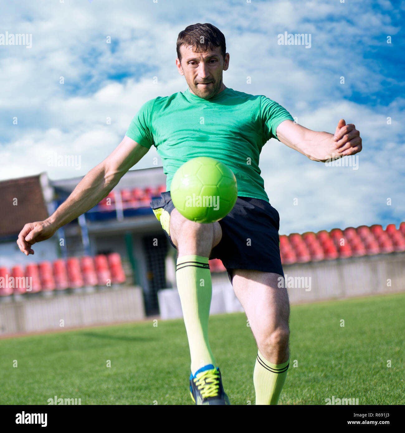 soccer player shooting ball Stock Photo - Alamy