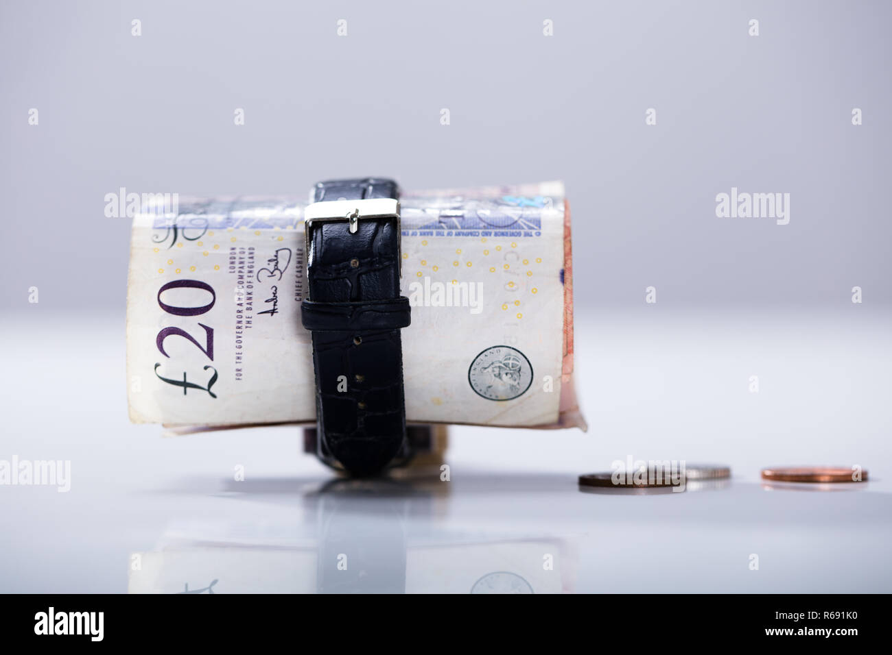 Rolled Up Twenty Pounds Currency Note Inside The Wrist Watch Stock ...