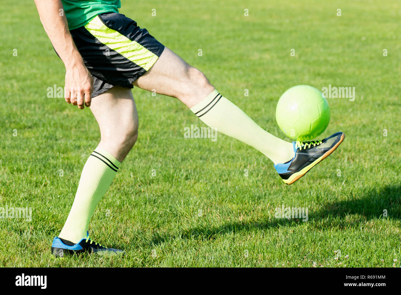 soccer player shooting ball Stock Photo - Alamy