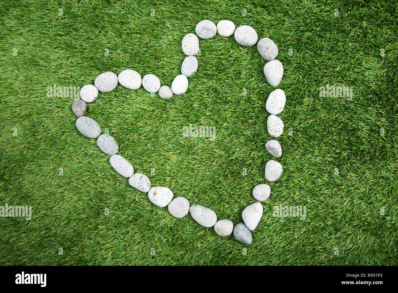 Heart shape made of pebble stones Stock Photo - Alamy