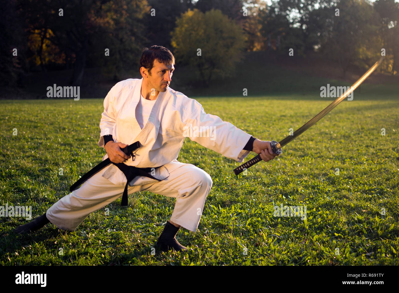 white ninja with sword Stock Photo - Alamy