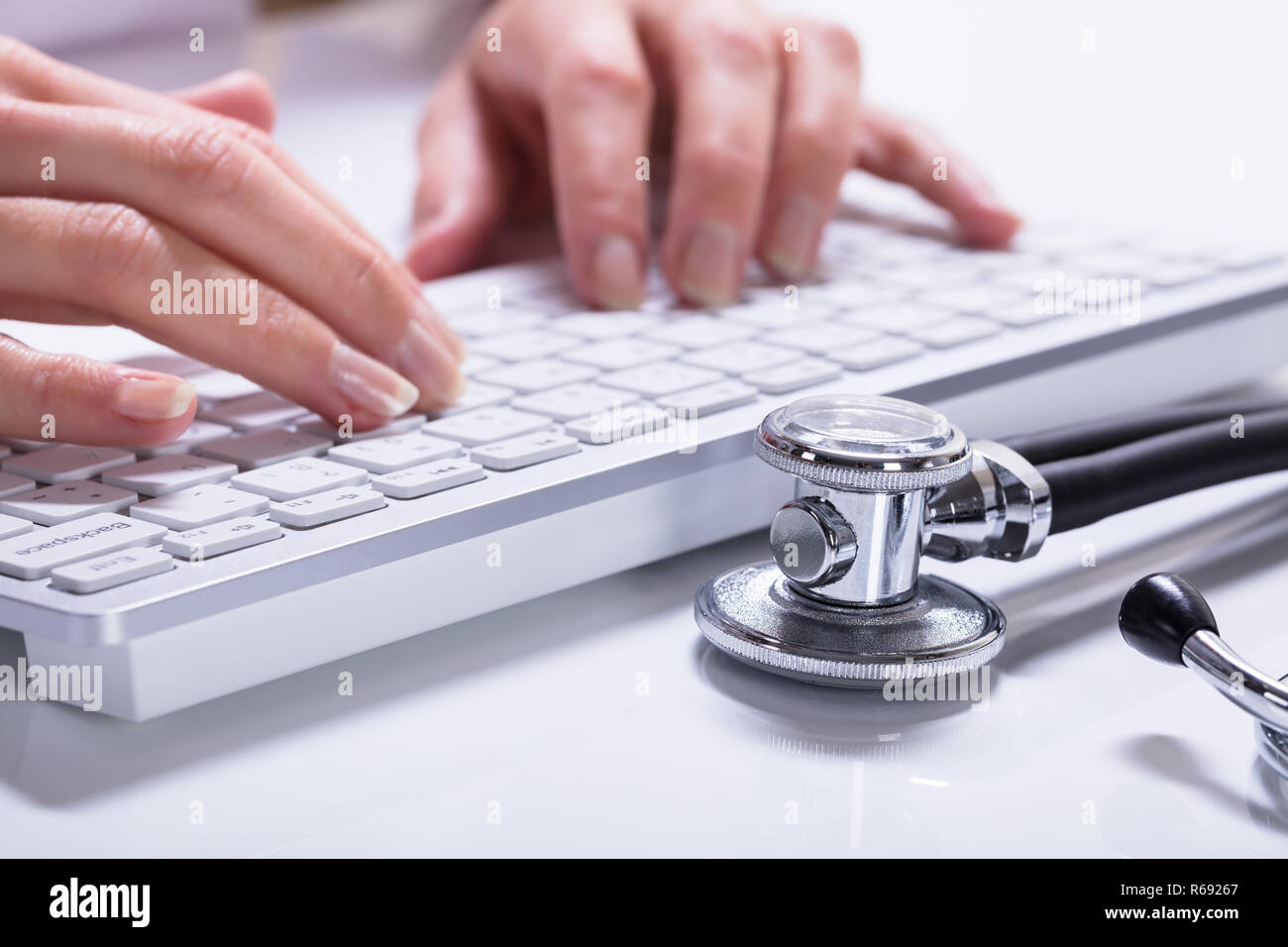 Woman's Hand Typing Stock Photo - Alamy