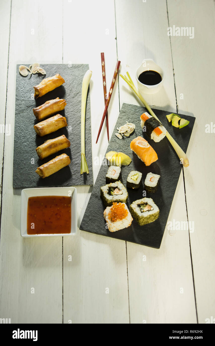 Spring Rolls And Sushi Stock Photo - Alamy