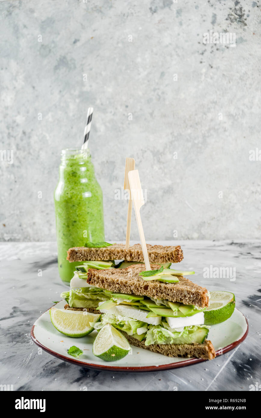 Vegan snack or lunch, healthy sandwiches with avocado and multigrain ...