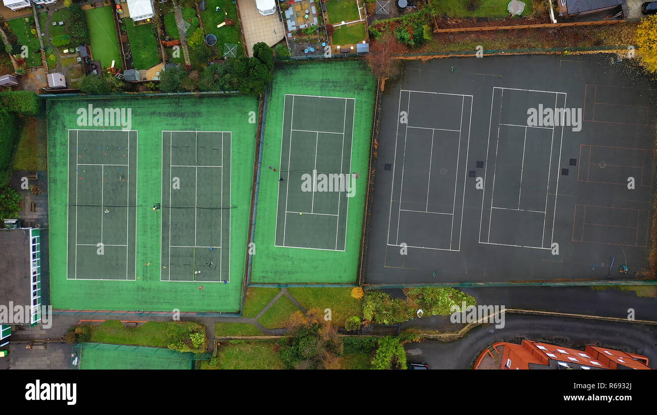 Aerial overhead view of a row of green tennis courts Stock Photo - Alamy