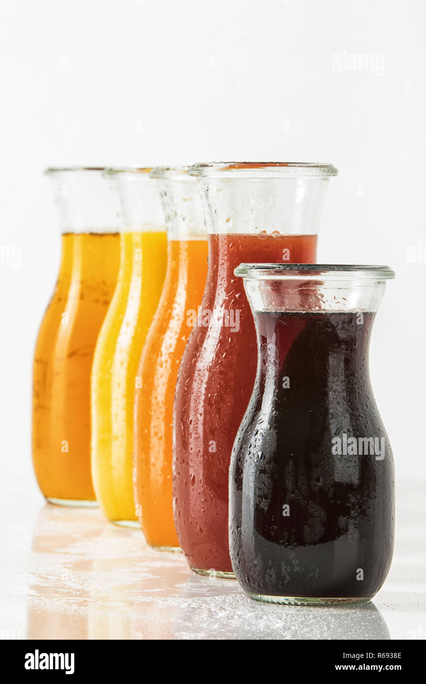 Fruit Juices In Juice Bottles Stock Photo - Alamy