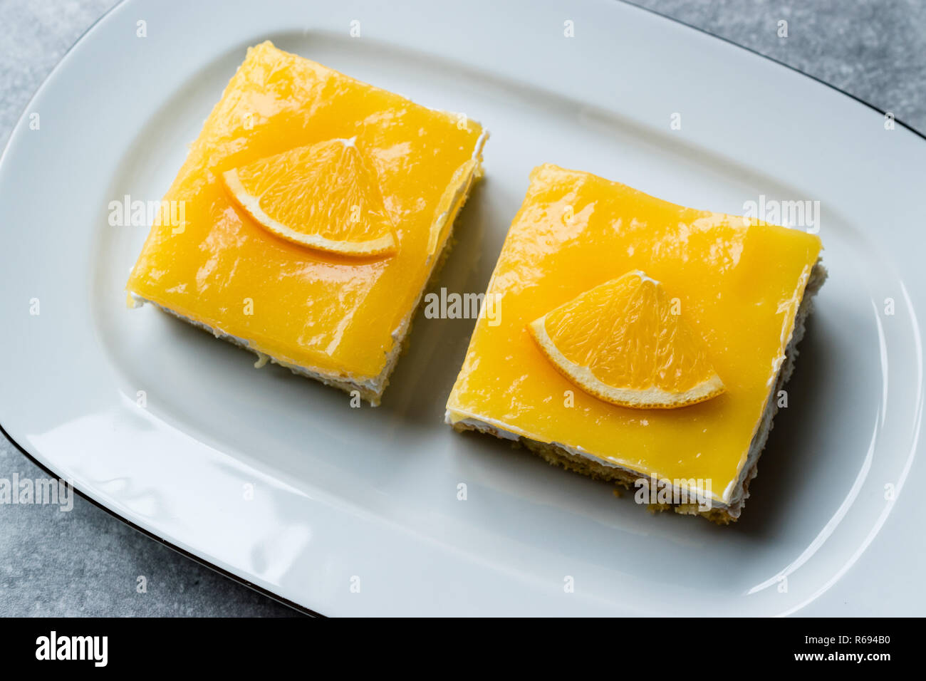 Square Slice of Orange Mascarpone Quark Cake. Dessert Concept Stock ...