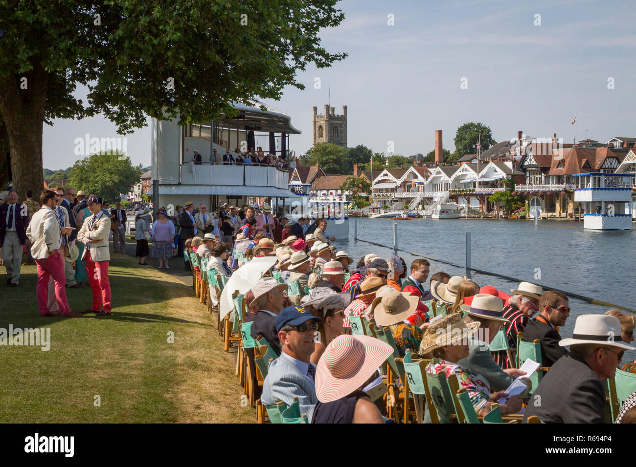 Specators pack the deck chairs b y the Finish Line in the Stewards ...