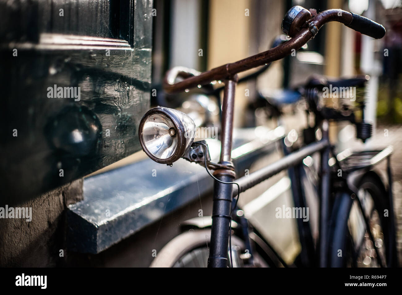 Rusty old bicycle with original details and traditional design in an ...