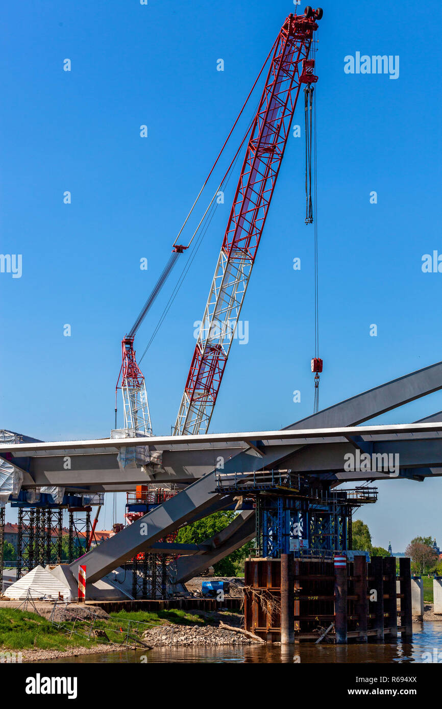 Construction Crane At Work On The New Building Of A Bridge Stock Photo ...