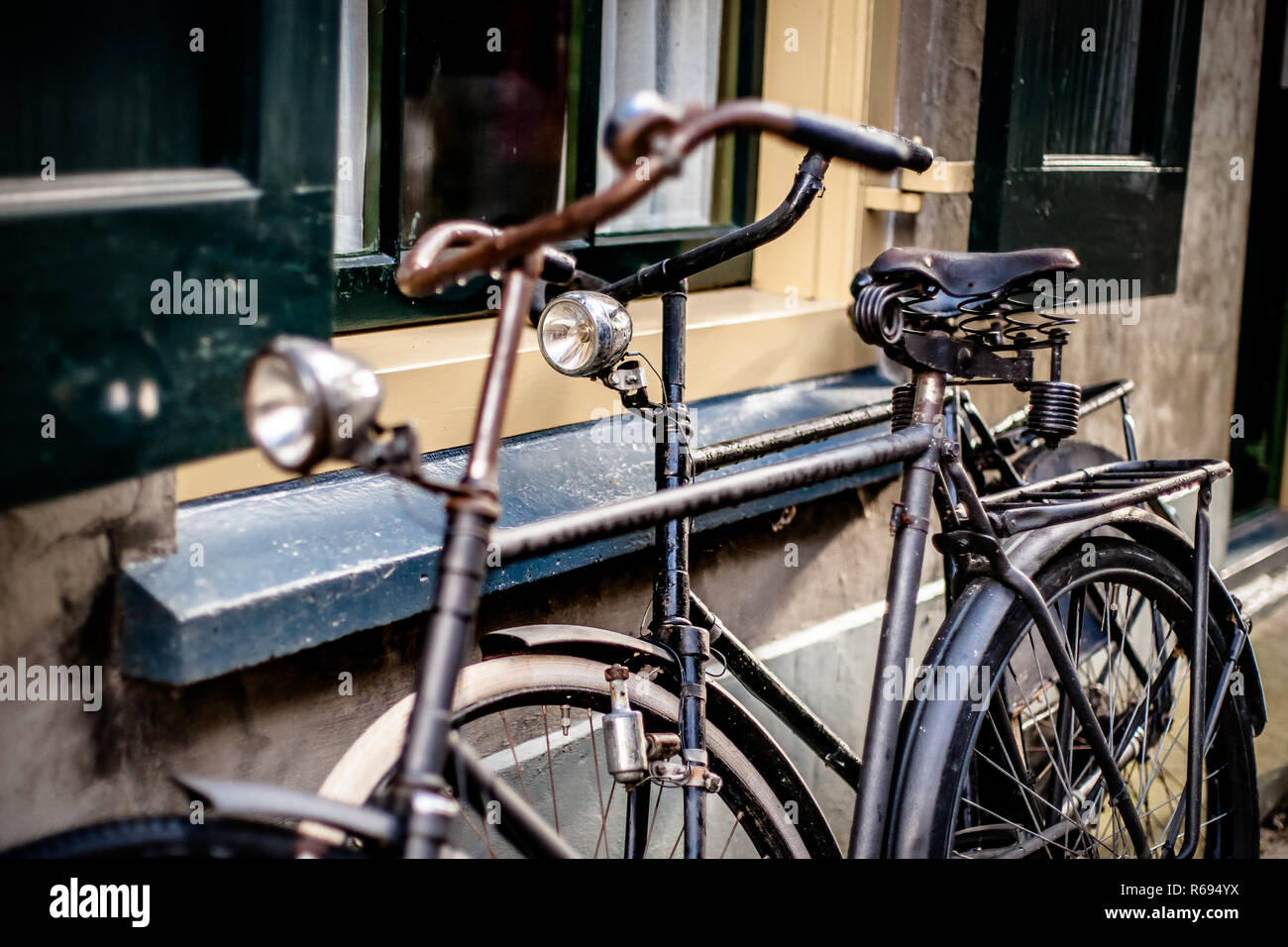 Rusty old bicycle with original details and traditional design in an ...