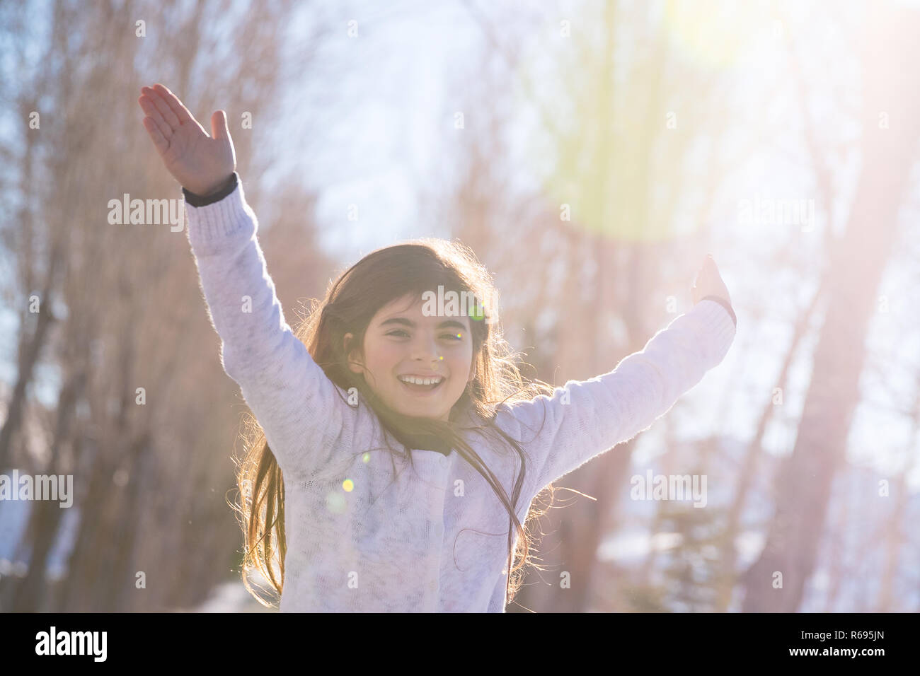Happy child having fun Stock Photo - Alamy