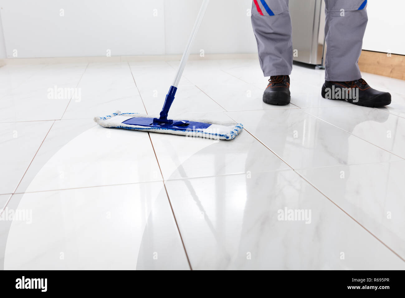 Worker Mopping Floor Stock Photo - Alamy
