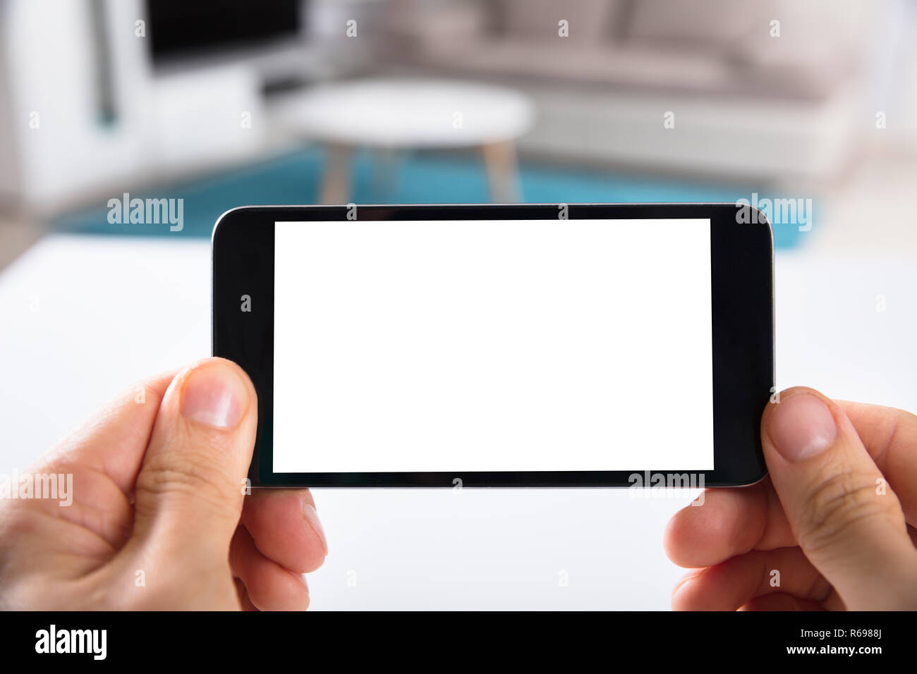 Human Hand Using Mobile Phone Stock Photo - Alamy