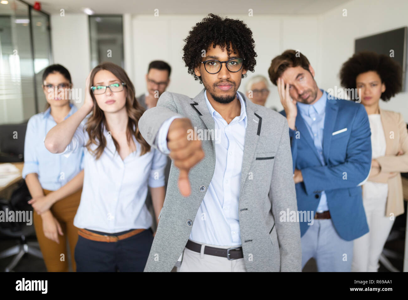 Group of unsuccessful business people and badly managed company leads ...