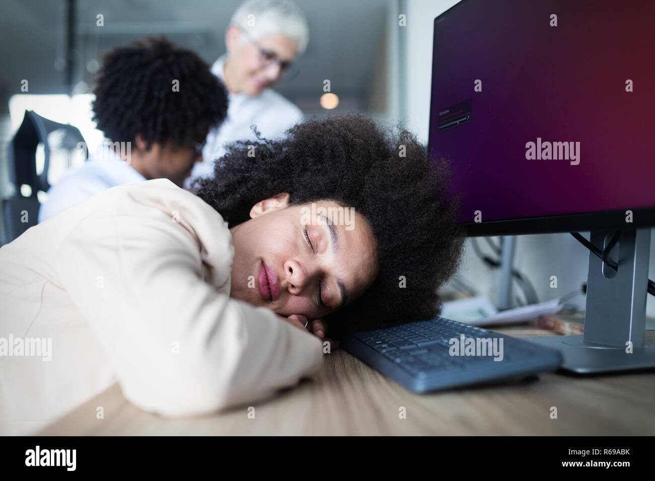Portrait of an exhausted business woman sleeping at work Stock Photo ...