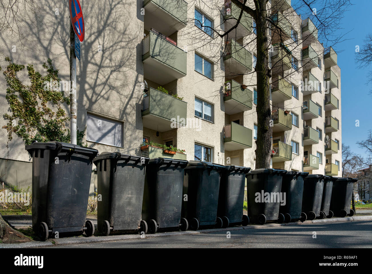 Series Of Garbage Cans On The Roadside Stock Photo - Alamy