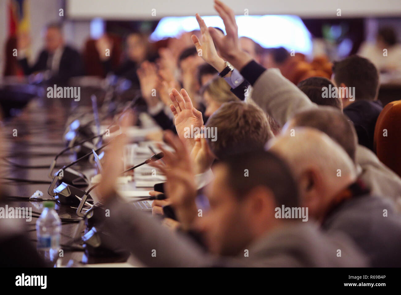 Vote raising hands hi-res stock photography and images - Alamy