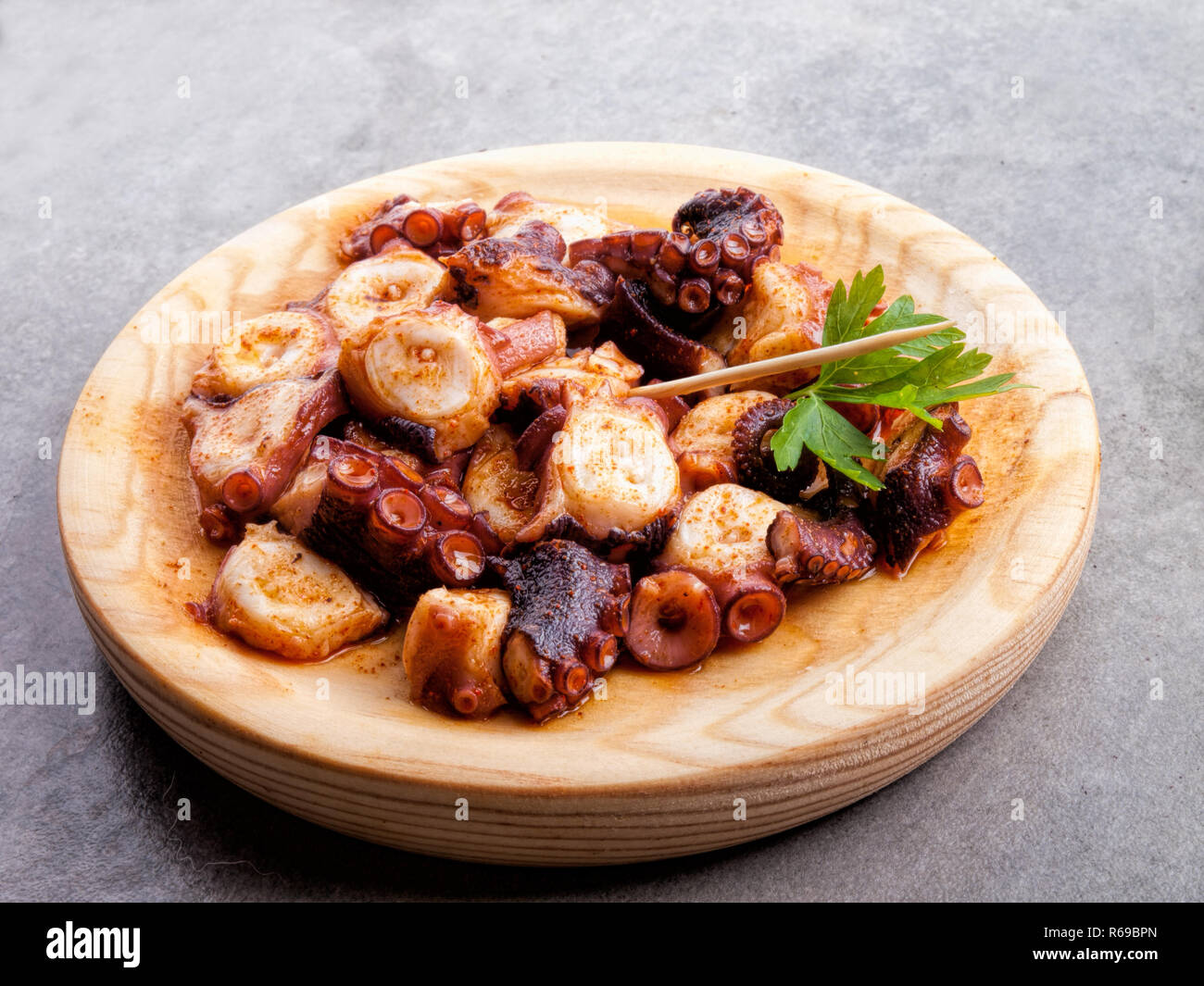 Cooked Tentacle Of An Octopus, Pulpo A La Gallega Stock Photo - Alamy