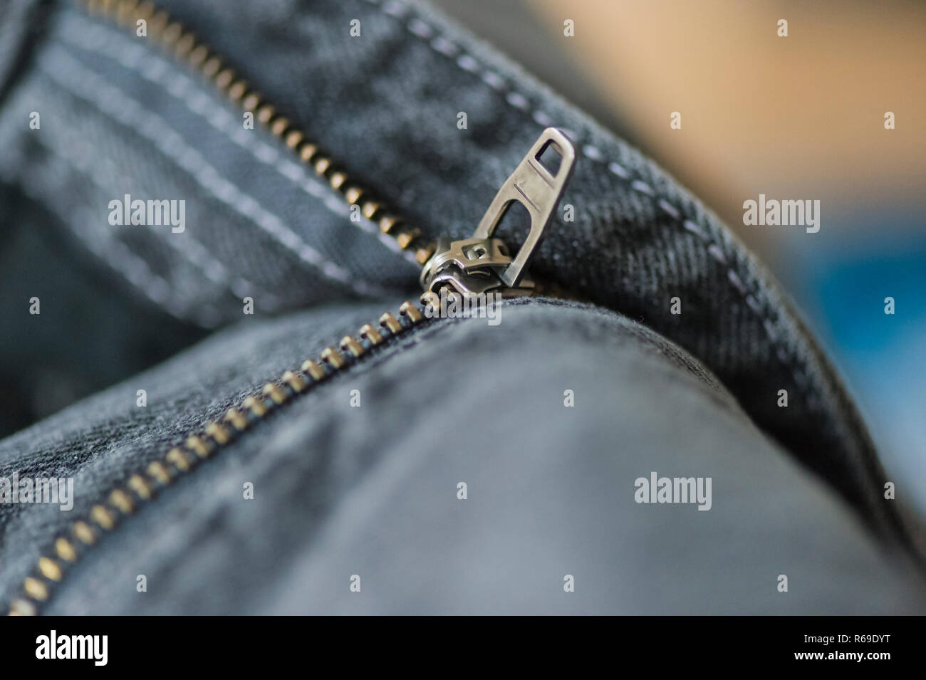Gold zipper detail hi-res stock photography and images - Alamy
