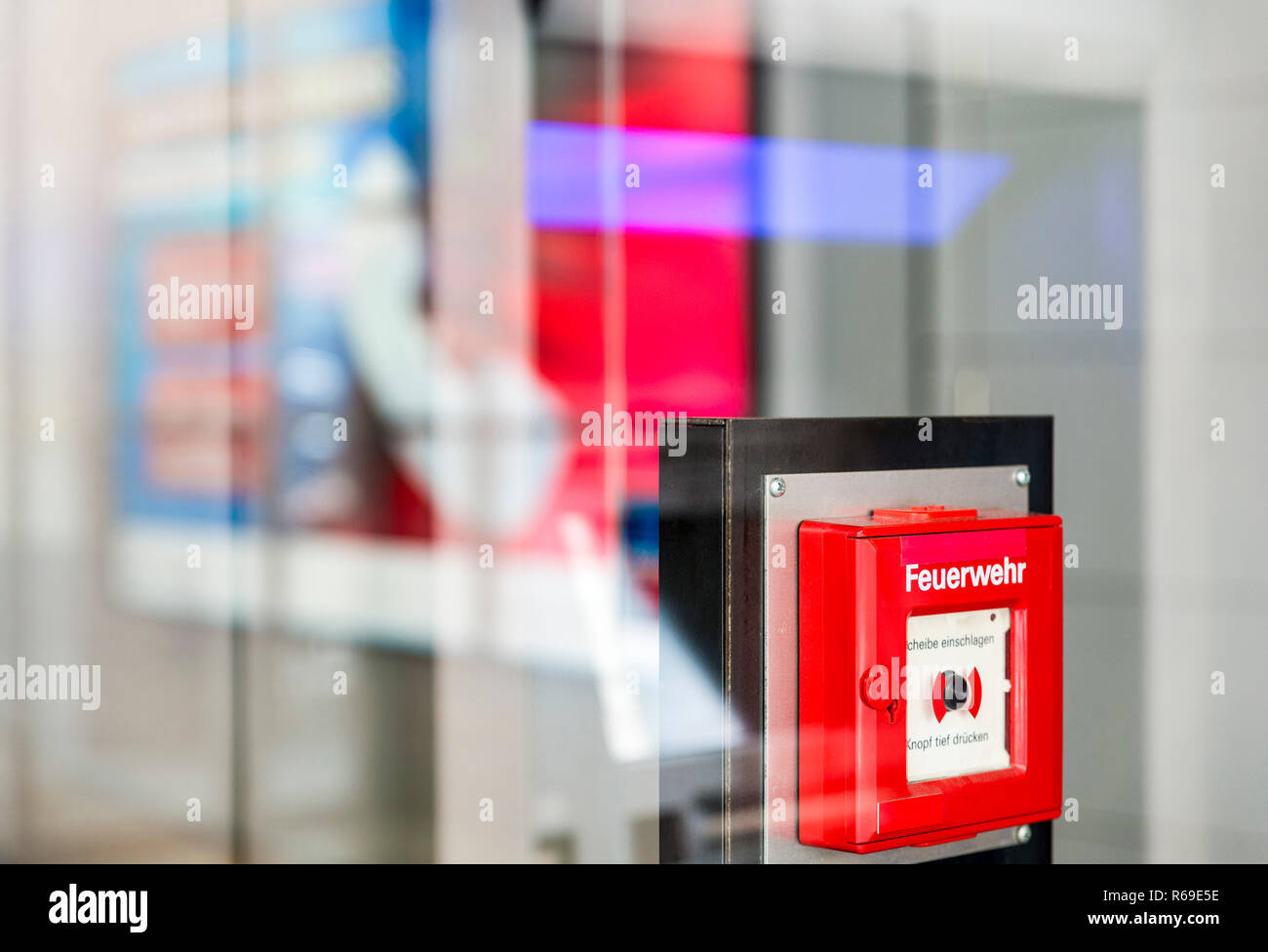 Alarm Button For The Fire Brigade Behind A Glass Pane Stock Photo - Alamy