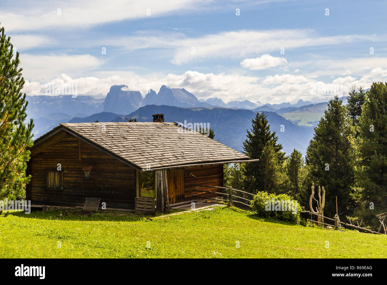 Cottage And Meadow In The Alps Stock Photo - Alamy