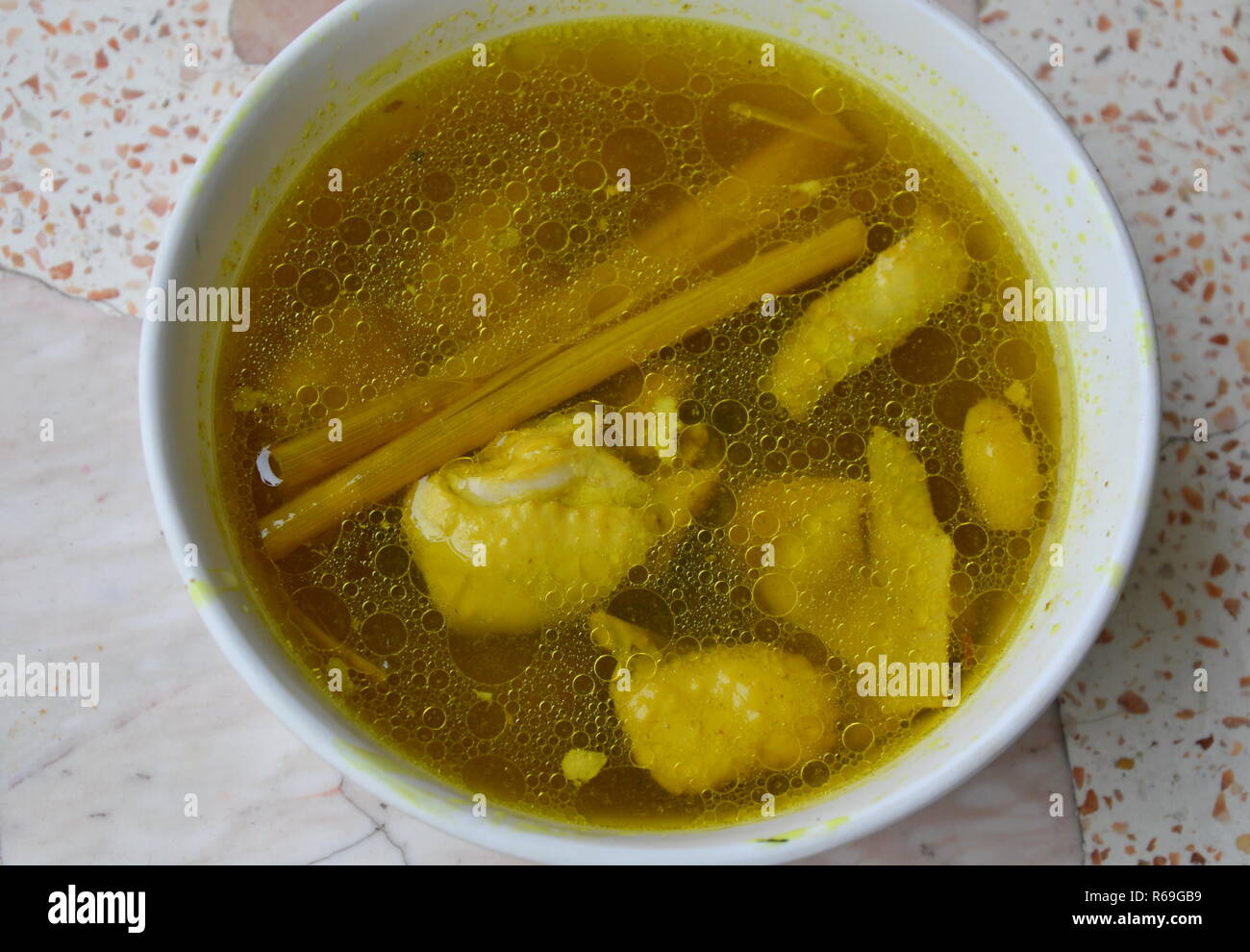 chicken boiled with turmeric spicy soup in cup Stock Photo - Alamy