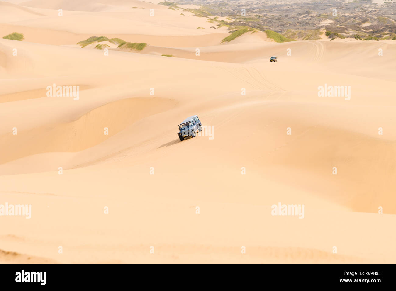 Two Offroad Vehicles Driving Through The Desert Stock Photo - Alamy