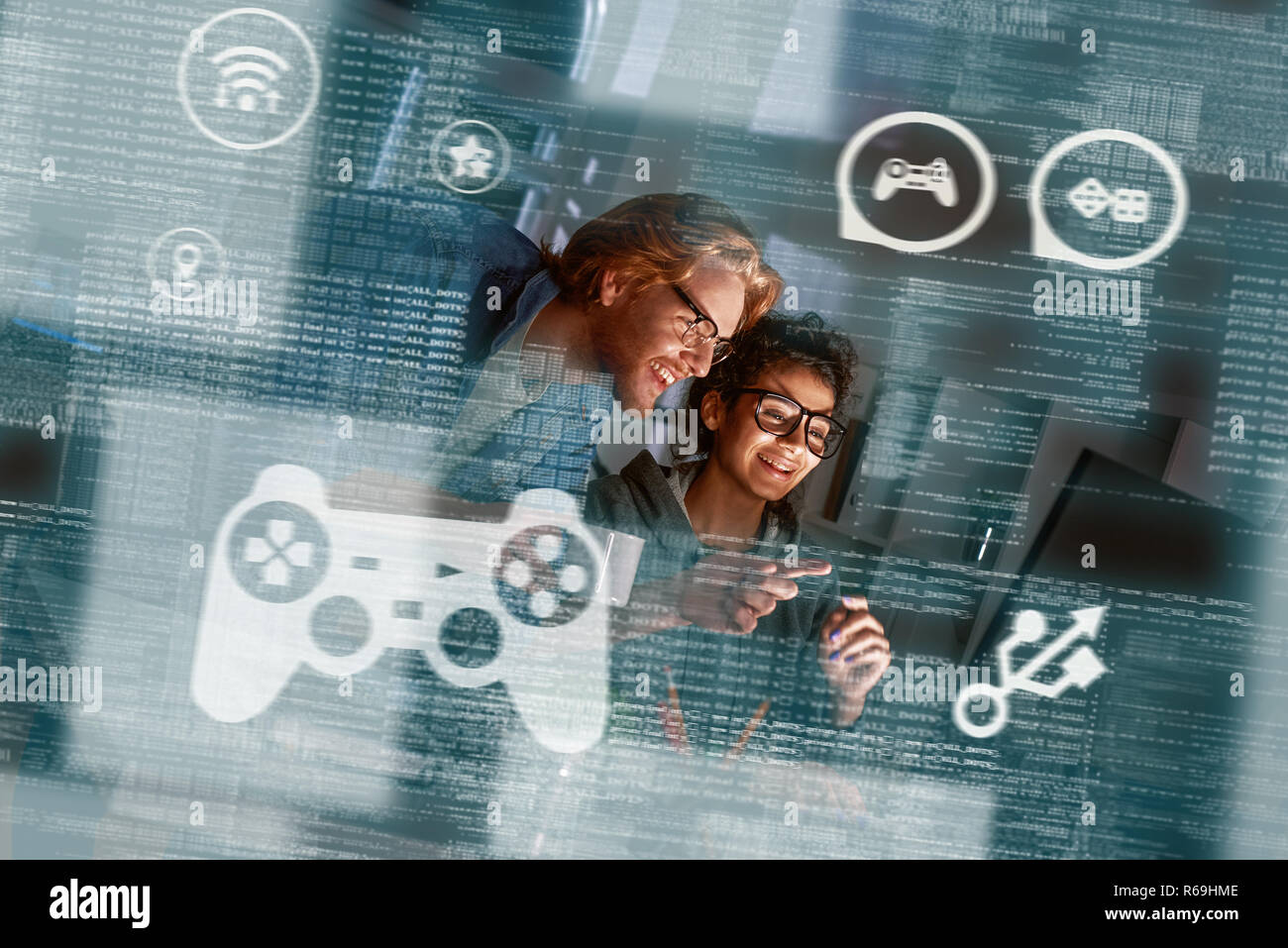 Young indian woman game developer and red haired man are laughting ...