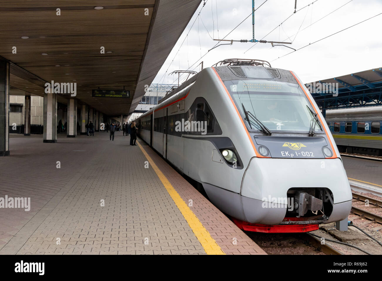 high-speed train at the station of the train station takes passengers ...