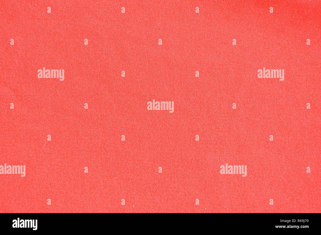 red stretch fabric texture and background Stock Photo - Alamy