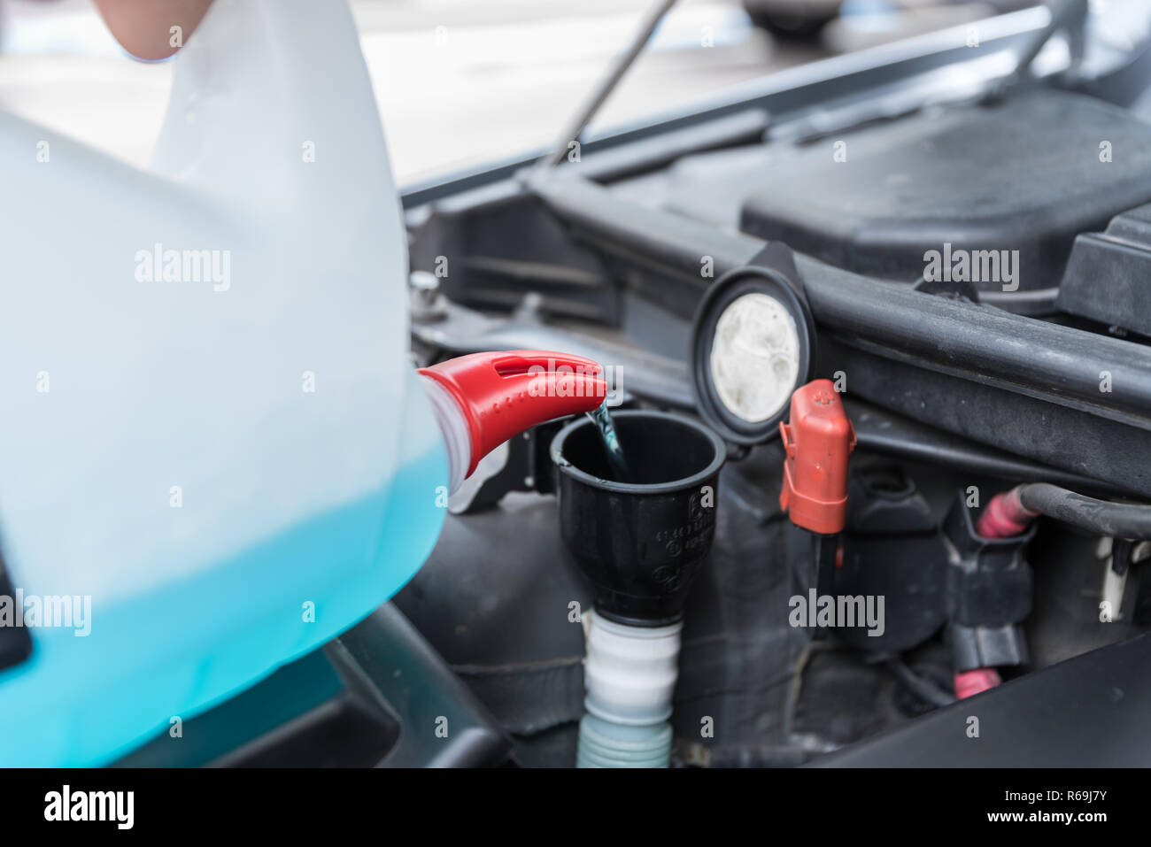 Disk Cleaner Is Refilled In Car Close Up Stock Photo - Alamy
