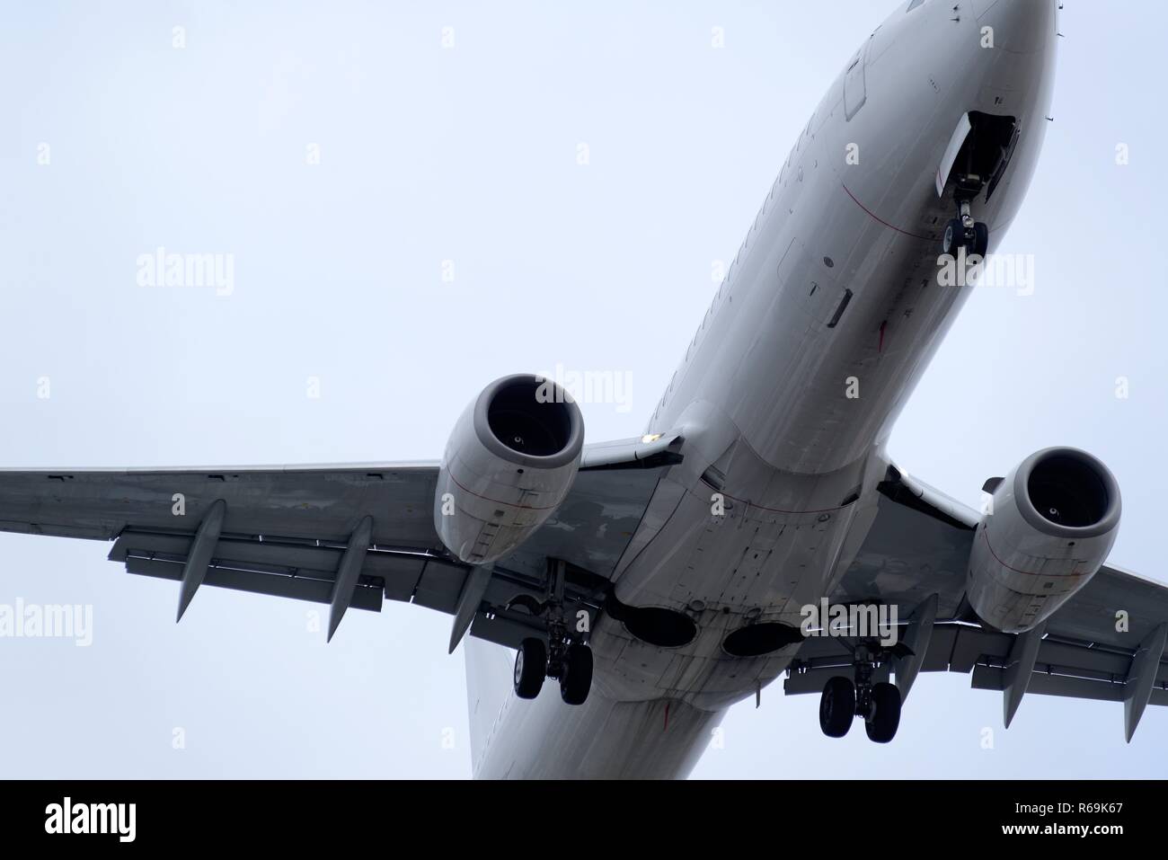 The Underside Of A Modern Airplane And Its Landing Gear Stock Photo - Alamy