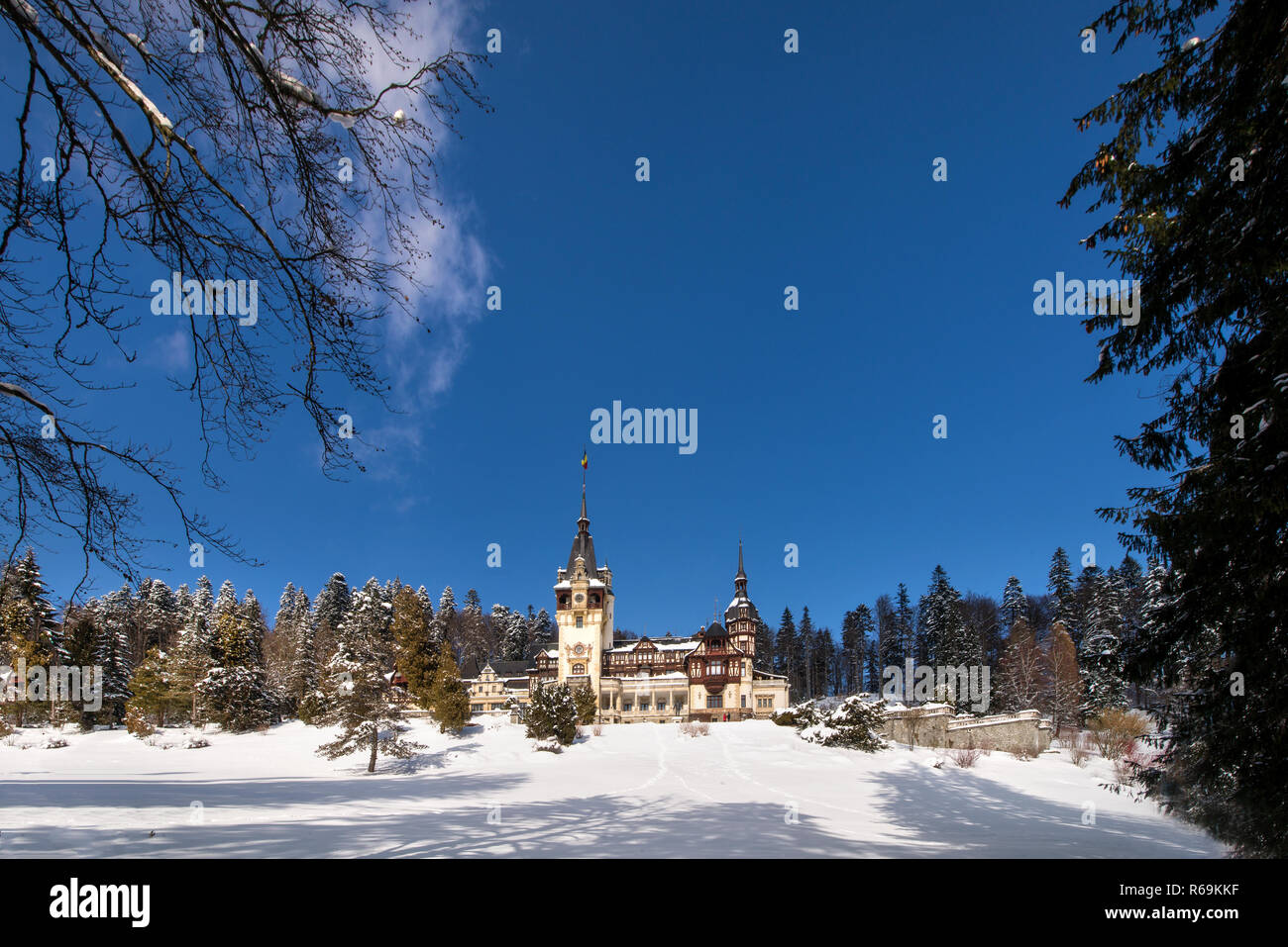 Peles castle in Romania. Beautiful, royal castle in snowy, white winter ...