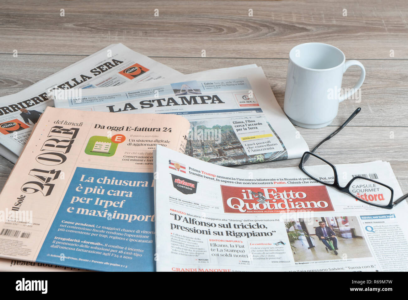 Business reading a newspaper magazine hi-res stock photography and ...