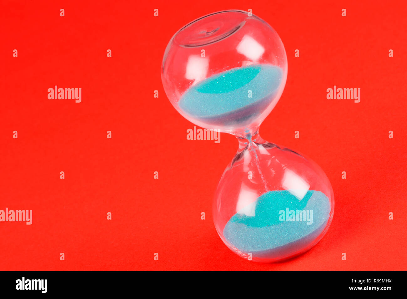 blue sand clock hourglass Stock Photo - Alamy