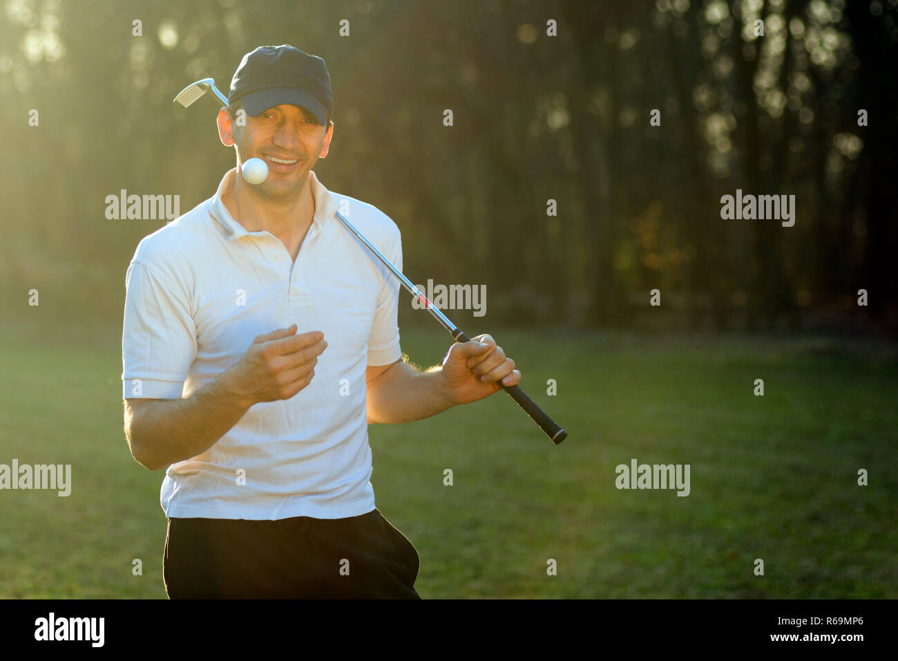 cheerful smiling golfer Stock Photo - Alamy