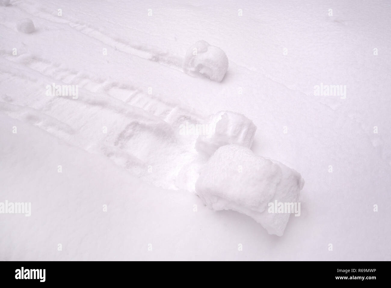 Big snowballs rolling and falling down from mountain peaks in forest ...